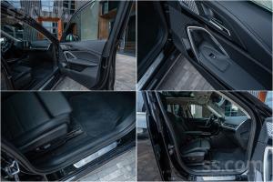 Black BMW X1 2023 in Riga, with an engine capacity of 0.00 L and mileage of 48 thousand km for 38900 €, photo 24 on AUTOMOTO.COM.LV