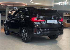 Black BMW X1 2023 in Klaipeda, with an engine capacity of 2.00 L and mileage of 124 thousand km for 32991 €, photo 7 on AUTOMOTO.COM.LV