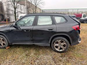 Black BMW X1 2024 in Panevezys, with an engine capacity of 2.00 L and mileage of 62 thousand km for 17500 €, photo 4 on AUTOMOTO.COM.LV