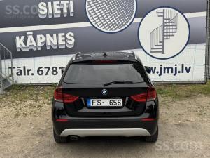 Black BMW X1 2010 in Riga, with an engine capacity of 2.00 L and mileage of 257 thousand km for 7100 €, photo 6 on AUTOMOTO.COM.LV