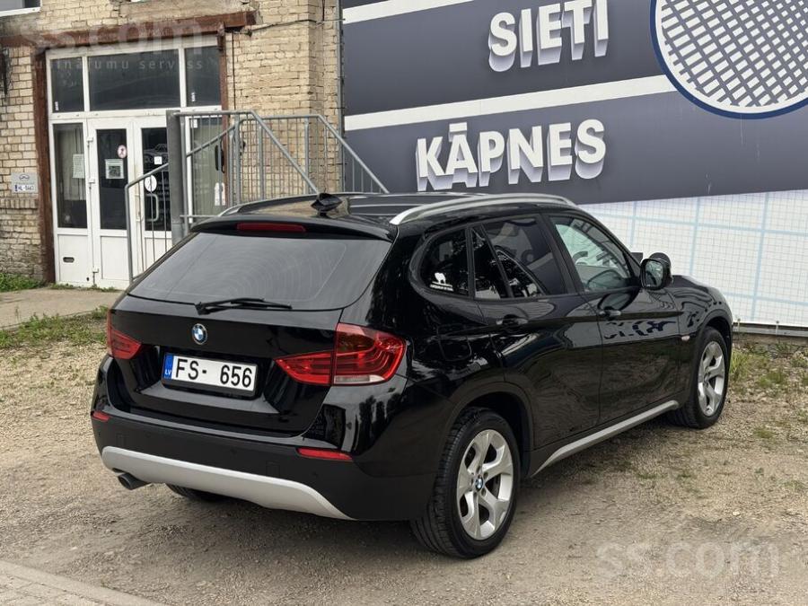 Black BMW X1 2010 in Riga, with an engine capacity of 2.00 L and mileage of 257 thousand km for 7100 €, photo 7 on AUTOMOTO.COM.LV