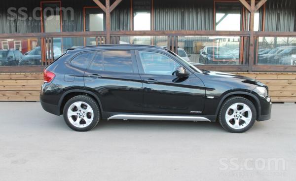 Black BMW X1 2012 in Riga, with an engine capacity of 2.00 L and mileage of 0 thousand km for 5950 €, photo 6 on AUTOMOTO.COM.LV
