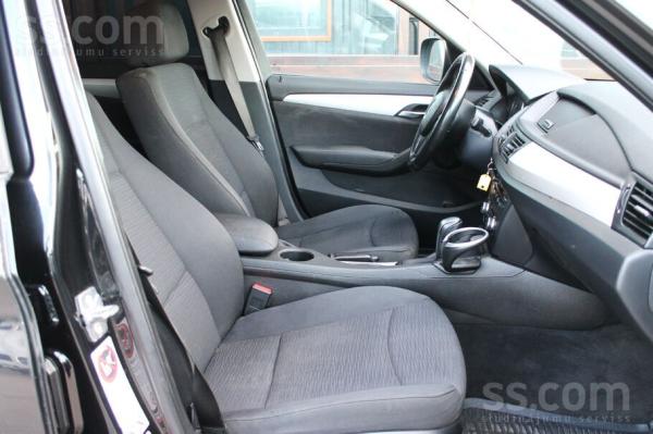 Black BMW X1 2012 in Riga, with an engine capacity of 2.00 L and mileage of 0 thousand km for 5950 €, photo 10 on AUTOMOTO.COM.LV