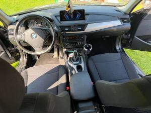 Black BMW X1 2013 in Utena, with an engine capacity of 2.00 L and mileage of 233 thousand km for 6800 €, photo 12 on AUTOMOTO.COM.LV