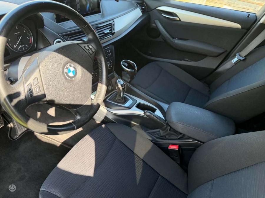 Black BMW X1 2013 in Utena, with an engine capacity of 2.00 L and mileage of 233 thousand km for 6800 €, photo 14 on AUTOMOTO.COM.LV