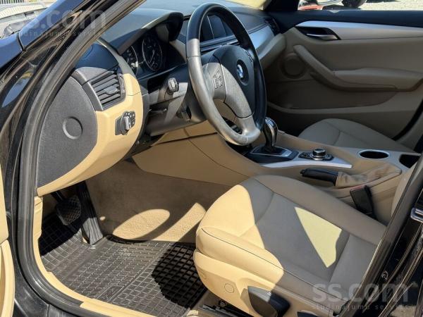 Black BMW X1 2014 in Riga, with an engine capacity of 2.00 L and mileage of 214 thousand km for 8950 €, photo 6 on AUTOMOTO.COM.LV