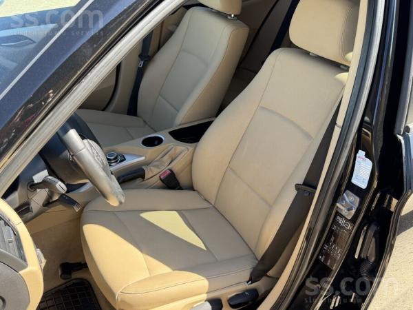 Black BMW X1 2014 in Riga, with an engine capacity of 2.00 L and mileage of 214 thousand km for 8950 €, photo 7 on AUTOMOTO.COM.LV