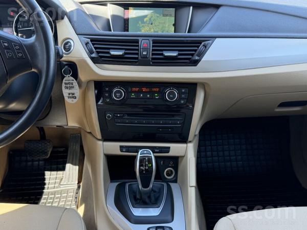 Black BMW X1 2014 in Riga, with an engine capacity of 2.00 L and mileage of 214 thousand km for 8950 €, photo 8 on AUTOMOTO.COM.LV