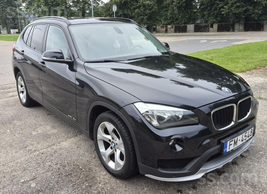 Black BMW X1 2014 in Riga, with an engine capacity of 2.00 L and mileage of 256 thousand km for 9100 €, photo 3 on AUTOMOTO.COM.LV
