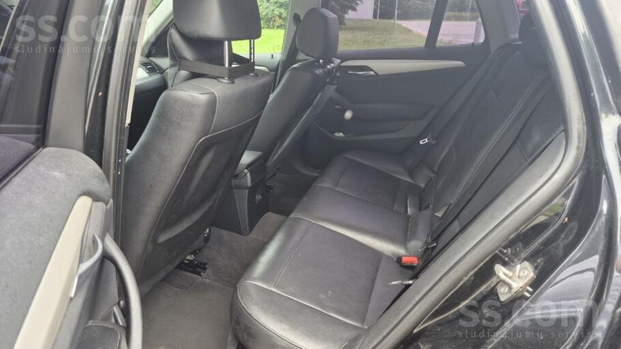 Black BMW X1 2014 in Riga, with an engine capacity of 2.00 L and mileage of 256 thousand km for 9100 €, photo 9 on AUTOMOTO.COM.LV