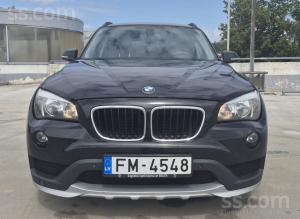 Black BMW X1 2014 in Riga, with an engine capacity of 2.00 L and mileage of 256 thousand km for 8600 €, photo 6 on AUTOMOTO.COM.LV