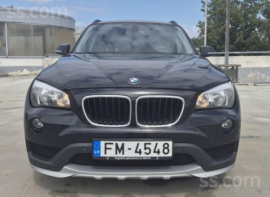 Black BMW X1 2014 in Riga, with an engine capacity of 2.00 L and mileage of 256 thousand km for 8600 €, photo 6 on AUTOMOTO.COM.LV
