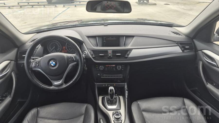 Black BMW X1 2014 in Riga, with an engine capacity of 2.00 L and mileage of 256 thousand km for 8600 €, photo 12 on AUTOMOTO.COM.LV