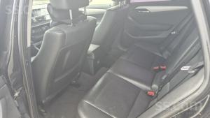 Black BMW X1 2014 in Riga, with an engine capacity of 2.00 L and mileage of 256 thousand km for 8600 €, photo 13 on AUTOMOTO.COM.LV