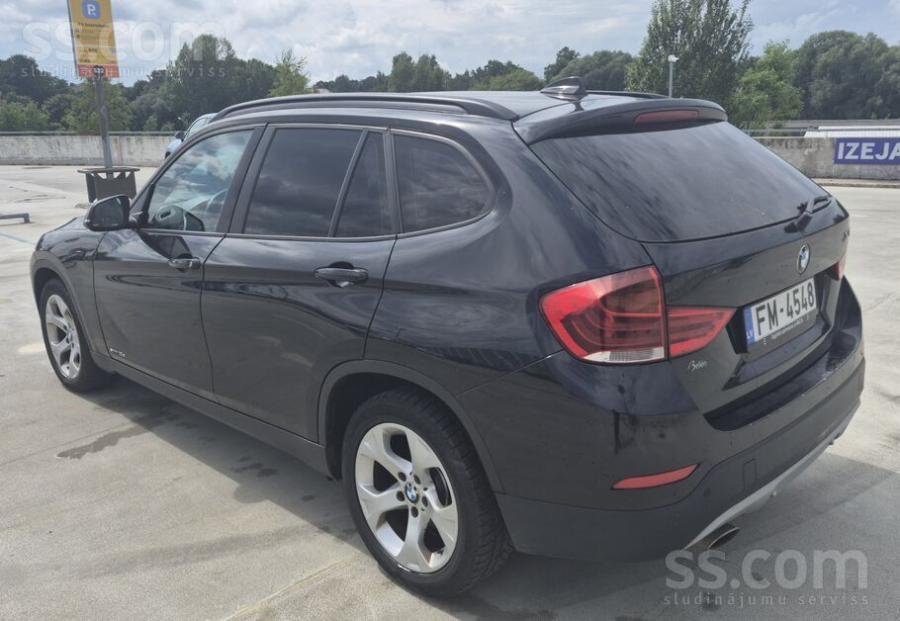 Black BMW X1 2014 in Riga, with an engine capacity of 2.00 L and mileage of 256 thousand km for 8600 €, photo 17 on AUTOMOTO.COM.LV