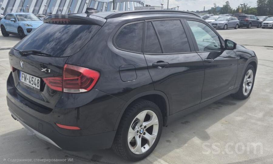 Black BMW X1 2014 in Riga, with an engine capacity of 2.00 L and mileage of 256 thousand km for 8600 €, photo 18 on AUTOMOTO.COM.LV