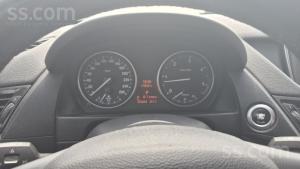 Black BMW X1 2014 in Riga, with an engine capacity of 2.00 L and mileage of 256 thousand km for 8600 €, photo 19 on AUTOMOTO.COM.LV