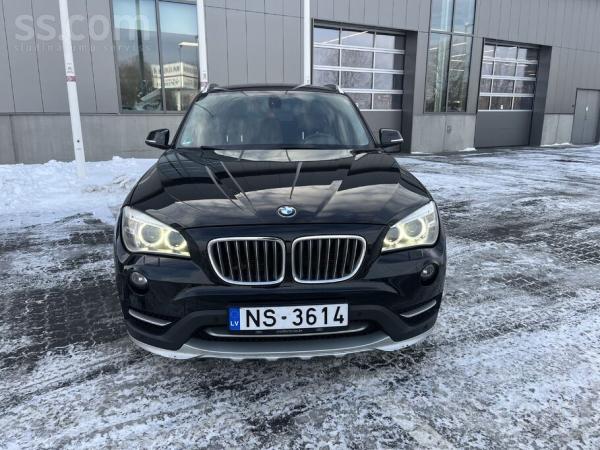 Black BMW X1 2014 in Riga, with an engine capacity of 2.00 L and mileage of 218 thousand km for 8900 €, photo 1 on AUTOMOTO.COM.LV