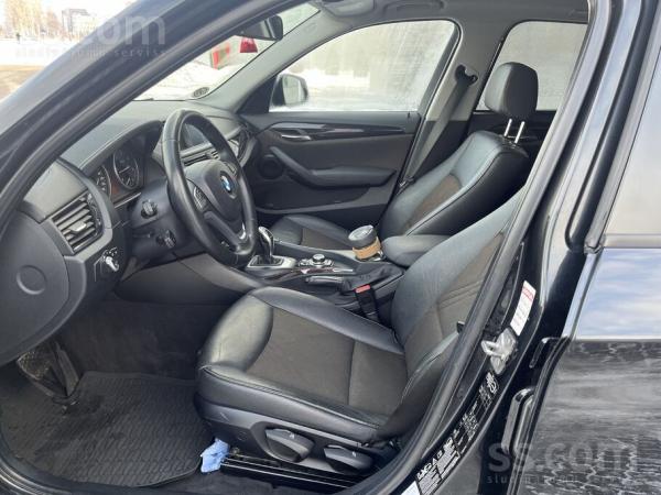 Black BMW X1 2014 in Riga, with an engine capacity of 2.00 L and mileage of 218 thousand km for 8900 €, photo 8 on AUTOMOTO.COM.LV