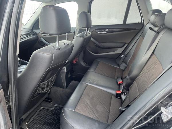 Black BMW X1 2014 in Riga, with an engine capacity of 2.00 L and mileage of 218 thousand km for 8900 €, photo 10 on AUTOMOTO.COM.LV