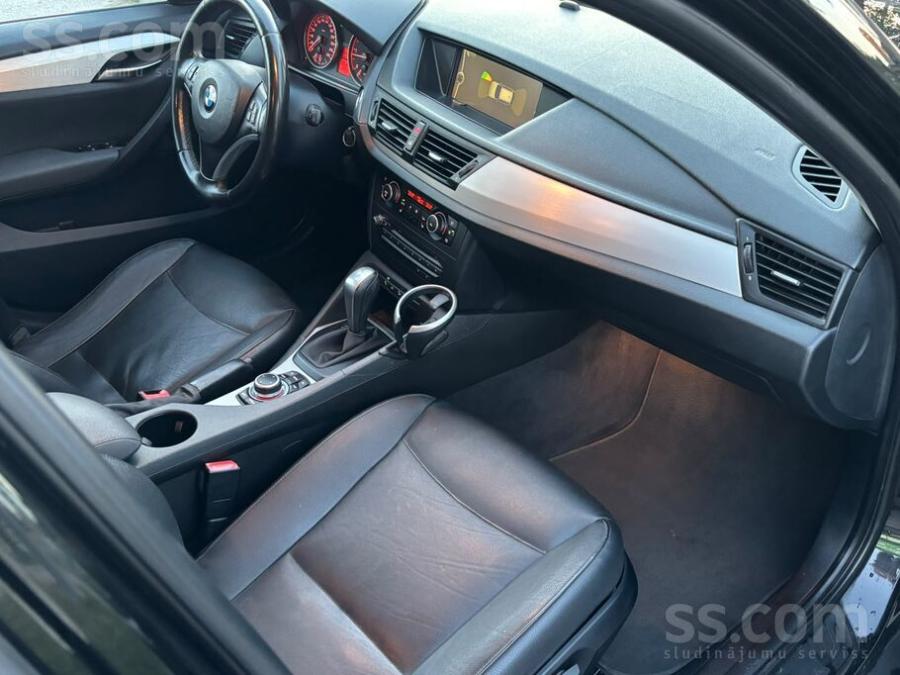 Black BMW X1 2010 in Riga, with an engine capacity of 2.00 L and mileage of 252 thousand km for 6850 €, photo 8 on AUTOMOTO.COM.LV