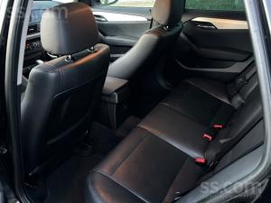 Black BMW X1 2010 in Riga, with an engine capacity of 2.00 L and mileage of 252 thousand km for 6850 €, photo 10 on AUTOMOTO.COM.LV