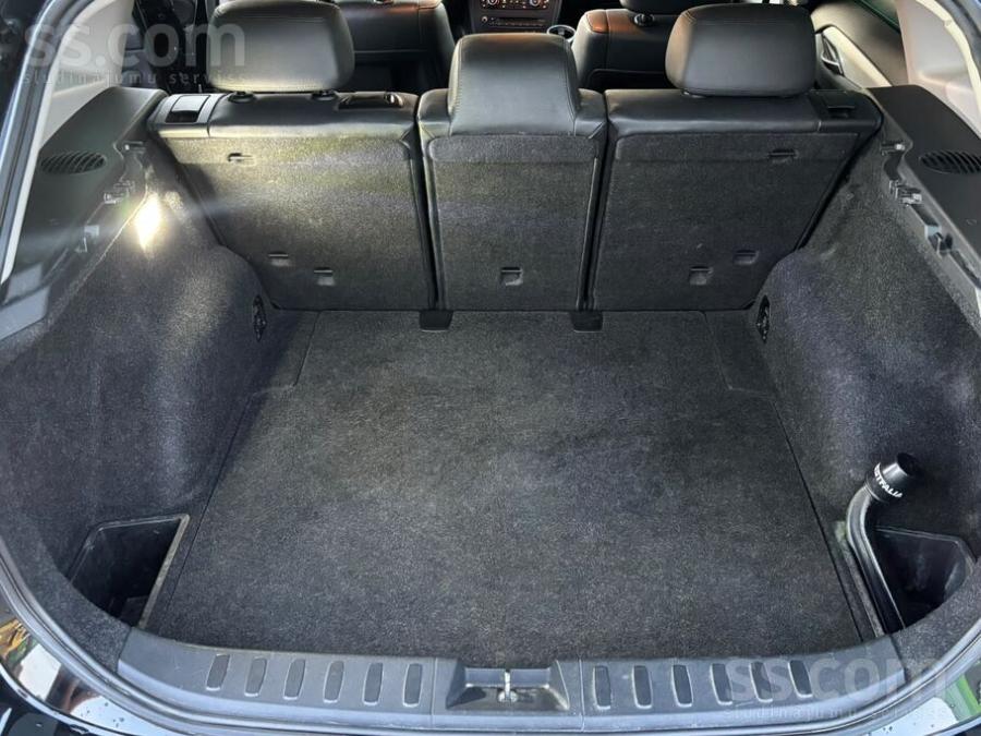 Black BMW X1 2010 in Riga, with an engine capacity of 2.00 L and mileage of 252 thousand km for 6850 €, photo 15 on AUTOMOTO.COM.LV