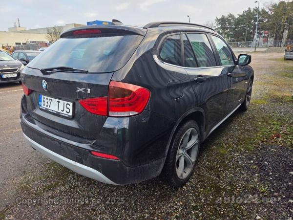Black BMW X1 2011 in Tallinn, with an engine capacity of 2.00 L and mileage of 202 thousand km for 6999 €, photo 4 on AUTOMOTO.COM.LV