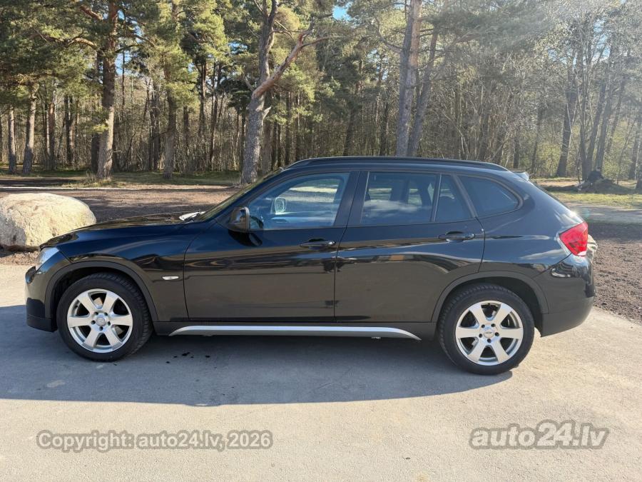 Black BMW X1 2011 in Tallinn, with an engine capacity of 2.00 L and mileage of 254 thousand km for 6900 €, photo 4 on AUTOMOTO.COM.LV