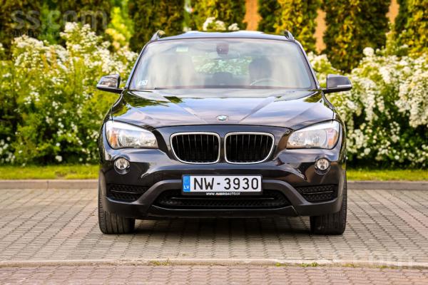 Black BMW X1 2012 in Jelgava, with an engine capacity of 2.00 L and mileage of 0 thousand km for 8950 €, photo 2 on AUTOMOTO.COM.LV