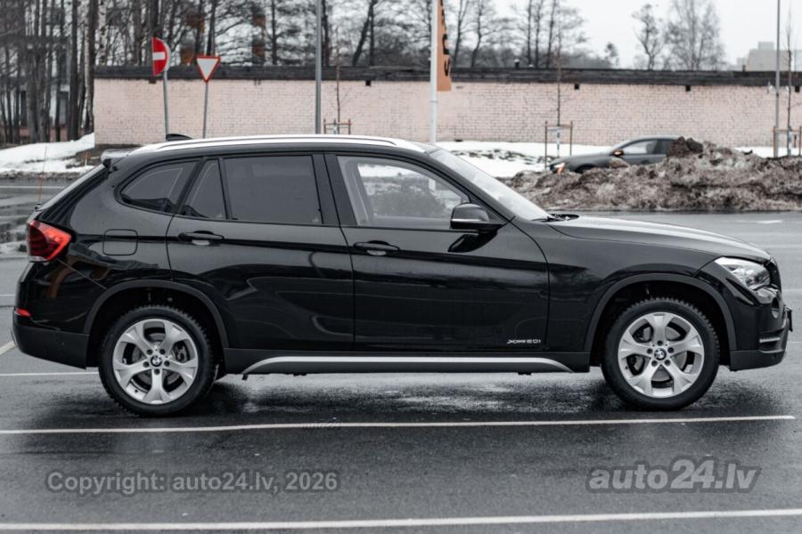 Black BMW X1 2013 in Tallinn, with an engine capacity of 2.00 L and mileage of 137 thousand km for 11500 €, photo 6 on AUTOMOTO.COM.LV