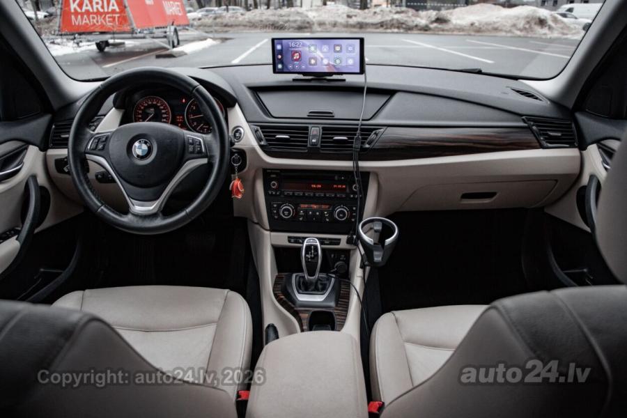 Black BMW X1 2013 in Tallinn, with an engine capacity of 2.00 L and mileage of 137 thousand km for 11500 €, photo 11 on AUTOMOTO.COM.LV