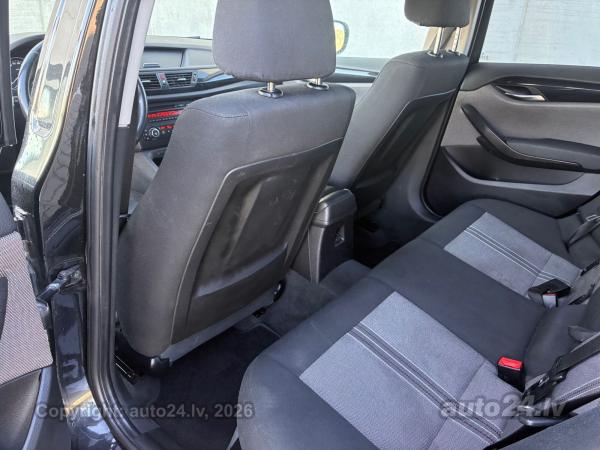 Black BMW X1 2013 in Tallinn, with an engine capacity of 2.00 L and mileage of 229 thousand km for 6199 €, photo 8 on AUTOMOTO.COM.LV