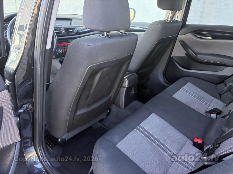 Black BMW X1 2013 in Tallinn, with an engine capacity of 2.00 L and mileage of 229 thousand km for 6199 €, photo 9 on AUTOMOTO.COM.LV