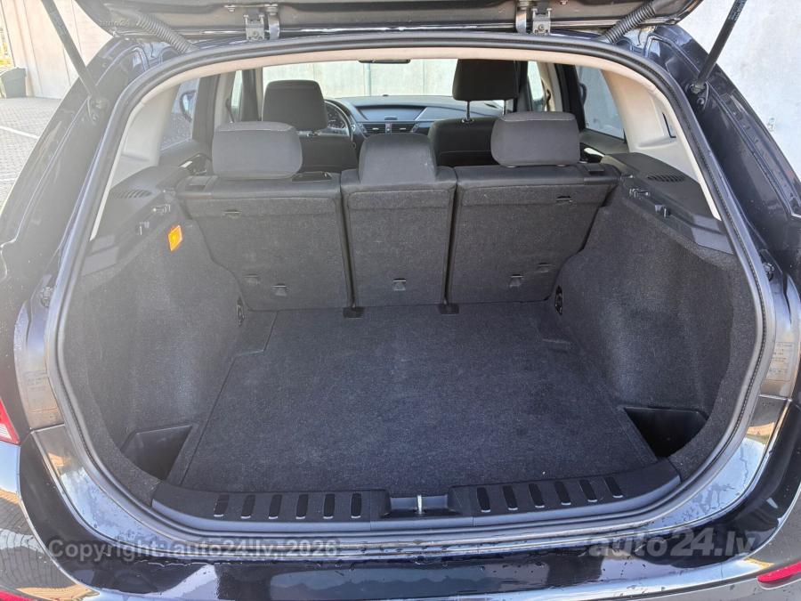 Black BMW X1 2013 in Tallinn, with an engine capacity of 2.00 L and mileage of 229 thousand km for 6199 €, photo 21 on AUTOMOTO.COM.LV