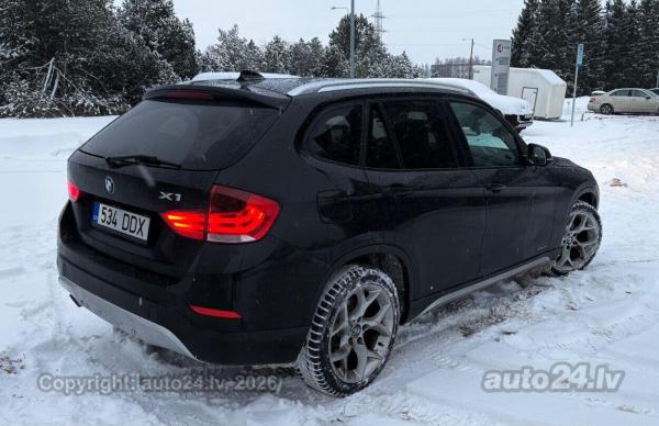 Black BMW X1 2014 in Tallinn, with an engine capacity of 2.00 L and mileage of 126 thousand km for 8900 €, photo 4 on AUTOMOTO.COM.LV