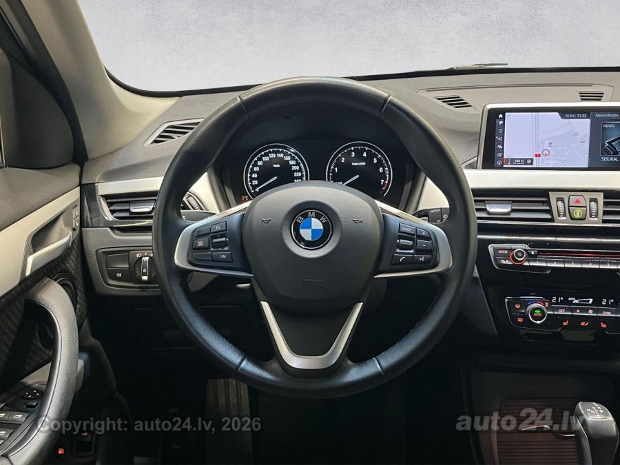 Black BMW X1 2021 in Tallinn, with an engine capacity of 1.50 L and mileage of 60 thousand km for 23900 €, photo 12 on AUTOMOTO.COM.LV