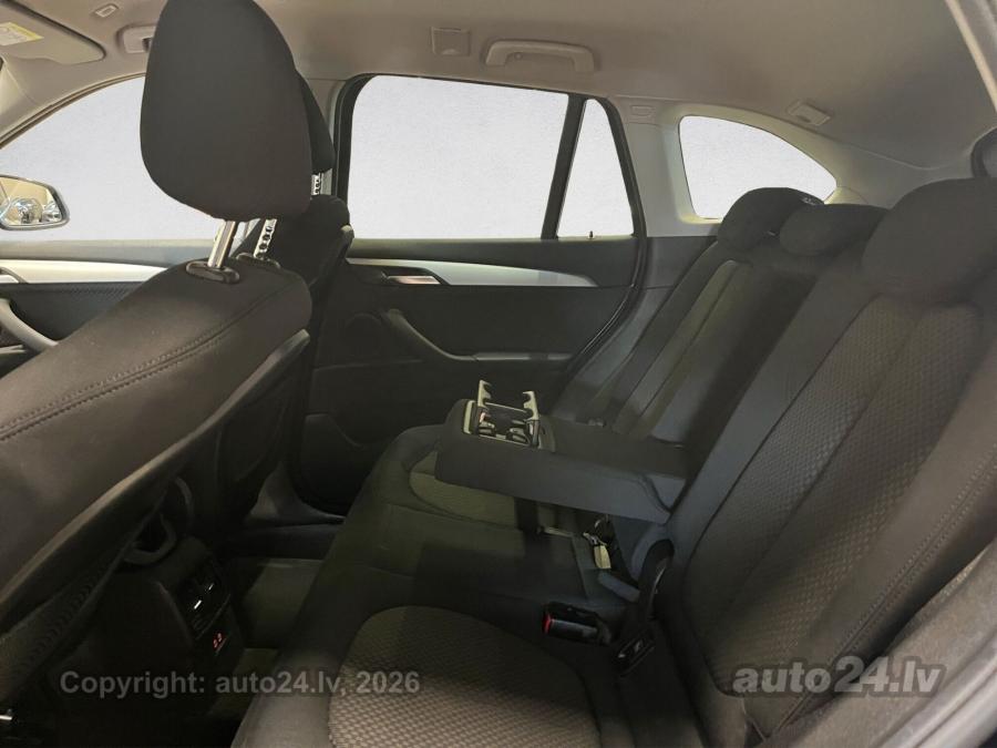 Black BMW X1 2021 in Tallinn, with an engine capacity of 1.50 L and mileage of 60 thousand km for 23900 €, photo 14 on AUTOMOTO.COM.LV