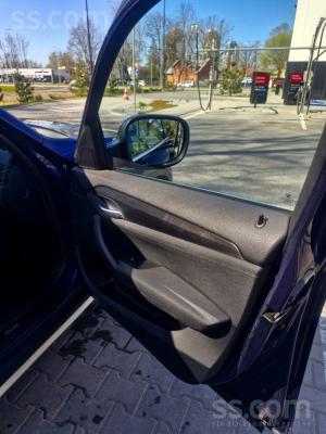 Blue BMW X1 2010 in Riga, with an engine capacity of 2.30 L and mileage of 204 thousand km for 10900 €, photo 14 on AUTOMOTO.COM.LV