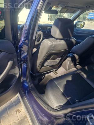 Blue BMW X1 2010 in Riga, with an engine capacity of 2.30 L and mileage of 204 thousand km for 10900 €, photo 16 on AUTOMOTO.COM.LV
