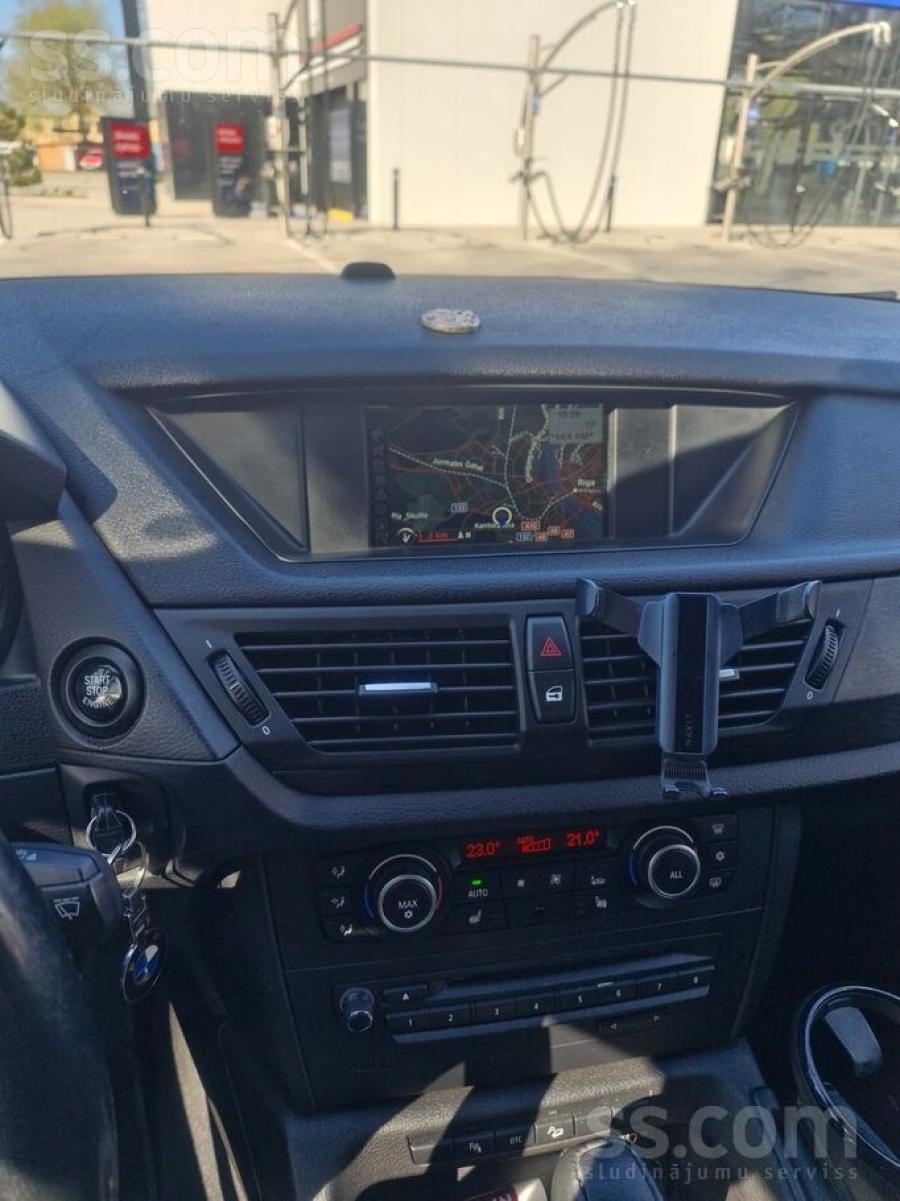Blue BMW X1 2010 in Riga, with an engine capacity of 2.30 L and mileage of 204 thousand km for 10900 €, photo 18 on AUTOMOTO.COM.LV