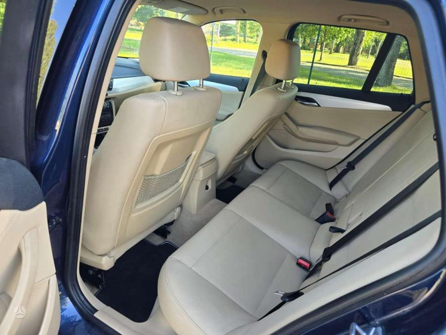 Blue BMW X1 2013 in Taurage, with an engine capacity of 2.00 L and mileage of 220 thousand km for 6499 €, photo 11 on AUTOMOTO.COM.LV