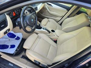 Blue BMW X1 2013 in Taurage, with an engine capacity of 2.00 L and mileage of 220 thousand km for 6499 €, photo 14 on AUTOMOTO.COM.LV