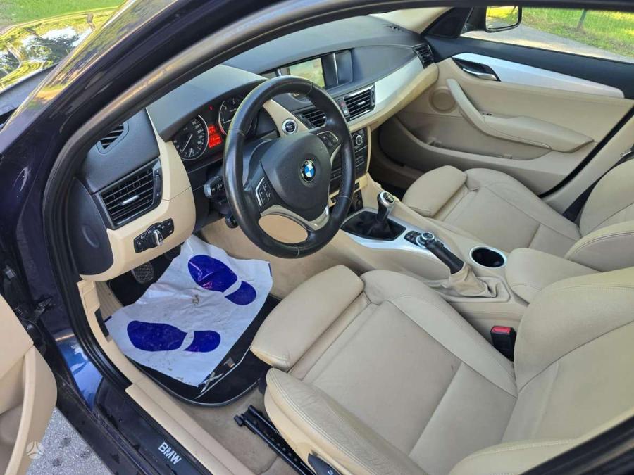 Blue BMW X1 2013 in Taurage, with an engine capacity of 2.00 L and mileage of 220 thousand km for 6499 €, photo 15 on AUTOMOTO.COM.LV
