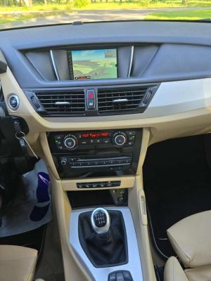 Blue BMW X1 2013 in Taurage, with an engine capacity of 2.00 L and mileage of 220 thousand km for 6499 €, photo 18 on AUTOMOTO.COM.LV