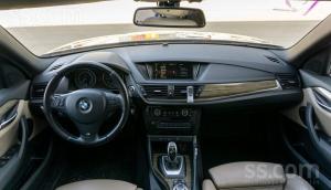 Blue BMW X1 2014 in Riga, with an engine capacity of 2.00 L and mileage of 269 thousand km for 9490 €, photo 12 on AUTOMOTO.COM.LV