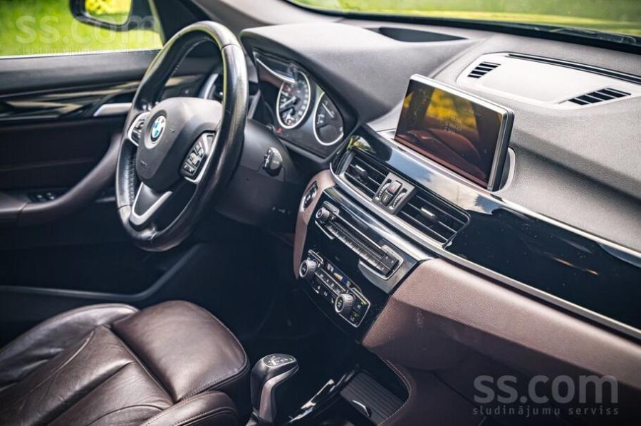Blue BMW X1 2016 in Riga, with an engine capacity of 2.00 L and mileage of 284 thousand km for 11990 €, photo 9 on AUTOMOTO.COM.LV