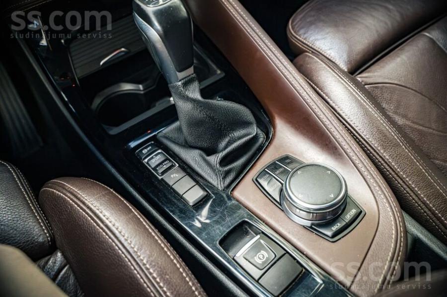 Blue BMW X1 2016 in Riga, with an engine capacity of 2.00 L and mileage of 284 thousand km for 11990 €, photo 14 on AUTOMOTO.COM.LV