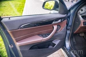 Blue BMW X1 2016 in Riga, with an engine capacity of 2.00 L and mileage of 284 thousand km for 11990 €, photo 21 on AUTOMOTO.COM.LV