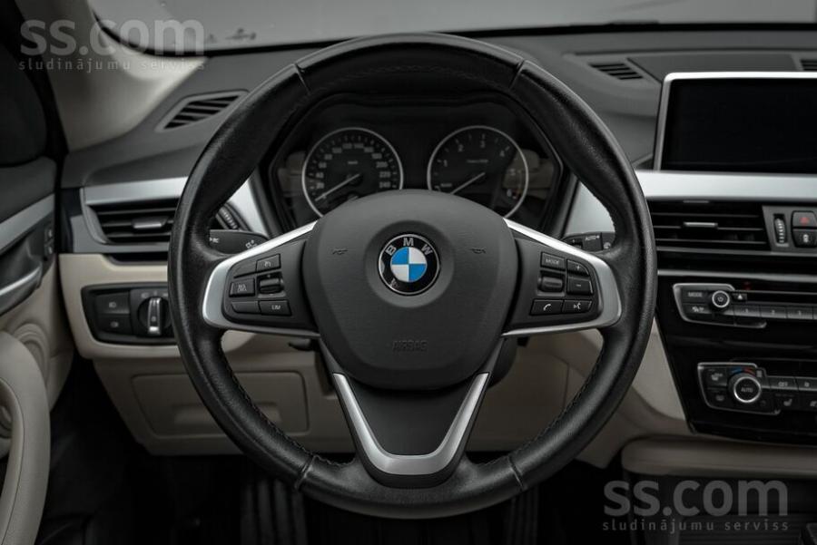 Blue BMW X1 2017 in Riga, with an engine capacity of 2.00 L and mileage of 92 thousand km for 18500 €, photo 17 on AUTOMOTO.COM.LV